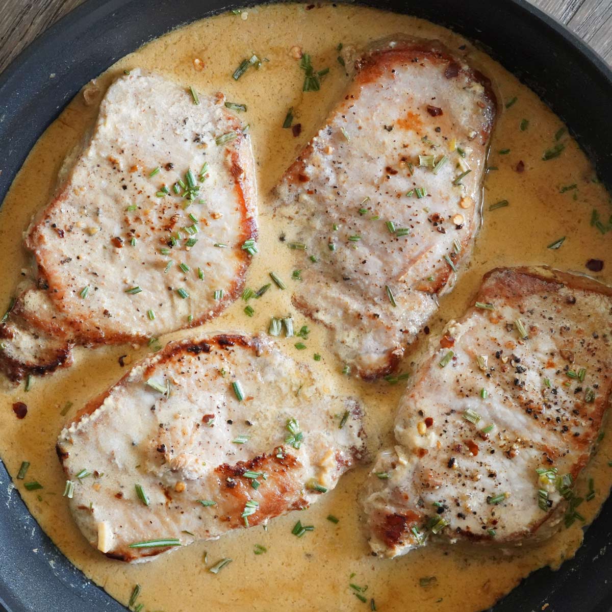 Creamy Garlic Pork Chops - Delightfully Low Carb